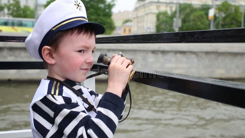A Boy Dressed As a Captain Looking through Stock Footage - Video of ...