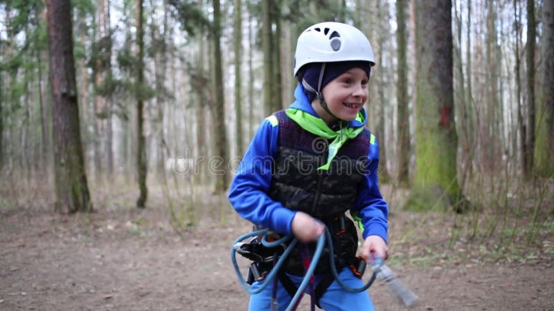 Boy Dressed and Equipped for Climbing Stand with Stock Video - Video of ...