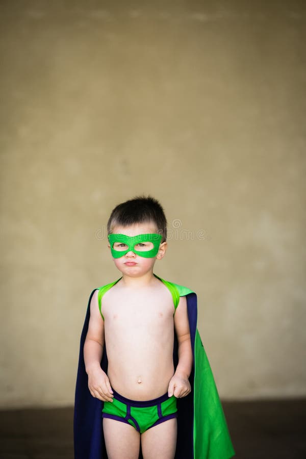 Child boy cape hero pout stock image. Image of vertical - 39342981