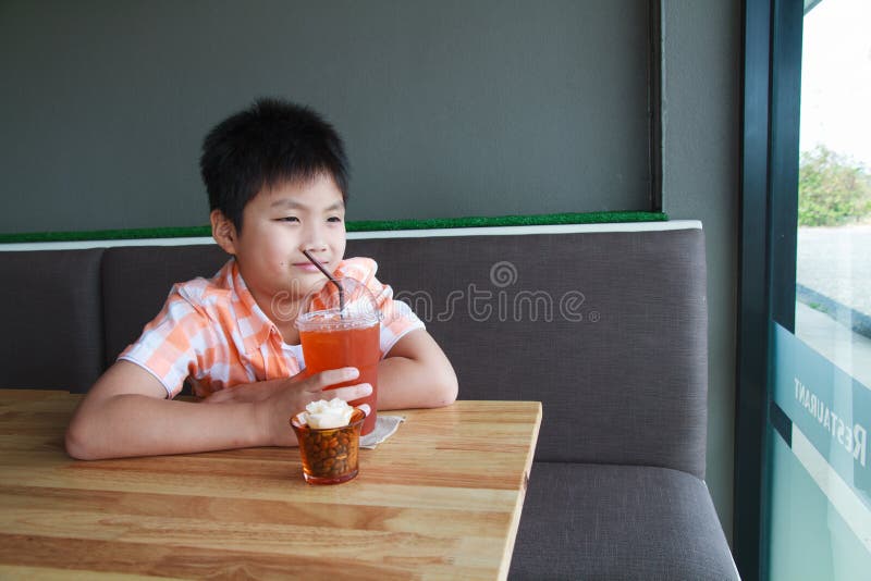 Boy drink stock image. Image of restaurant, emotion, male - 39882281