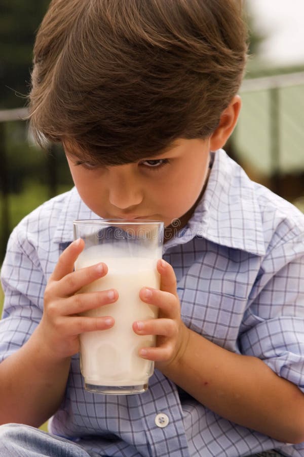 Boy drinking milk stock photo. Image of milk, eating, enjoyment - 2250068