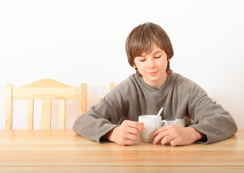 Boy drinking tea stock image. Image of morning, smiling - 48809049