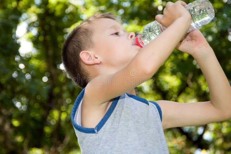 Boy drinking water stock image. Image of closeup, funny - 20554763