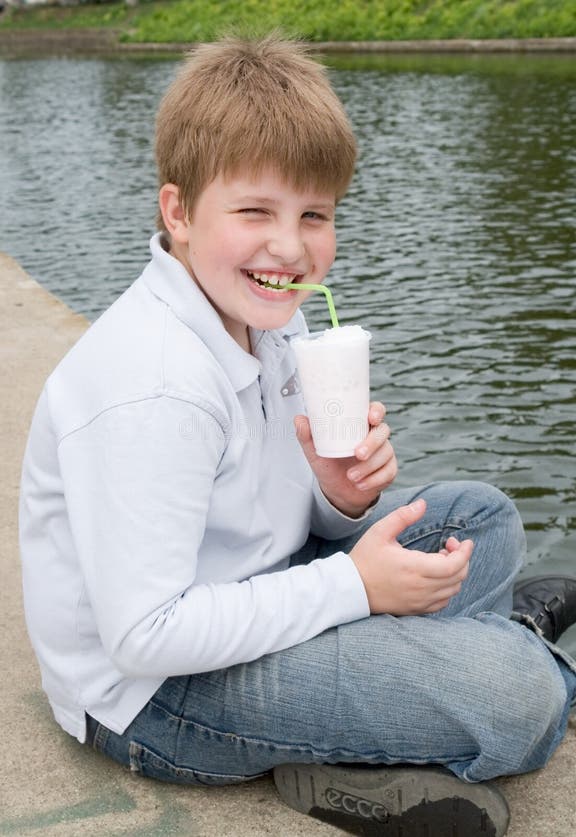 Boy drinks milkshake stock image. Image of food, drinks - 2655203