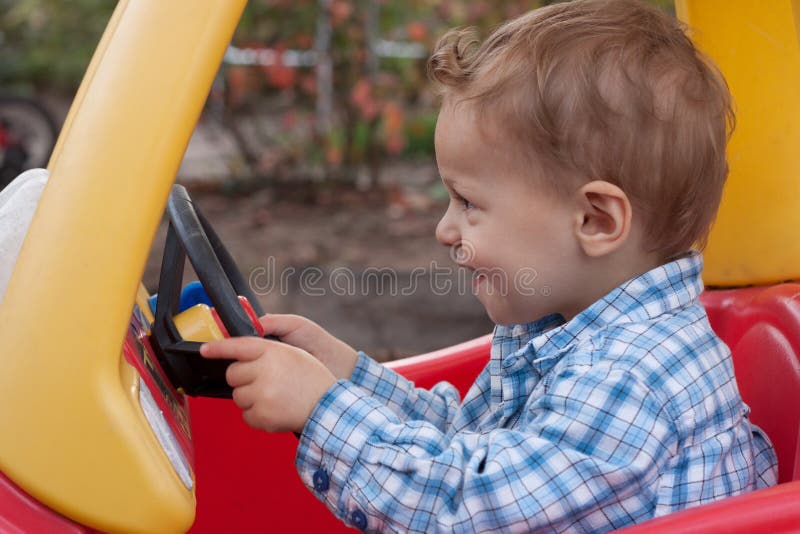 Boy Driving Car stock photo. Image of play, yellow, playing - 28183606