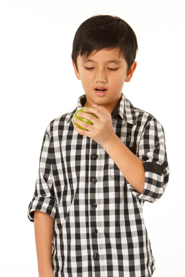 Boy eat apple stock image. Image of hold, food, portrait - 32045061