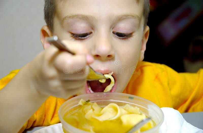 Boy Eating stock photo. Image of wonton, lunch, soup, toddler - 122558