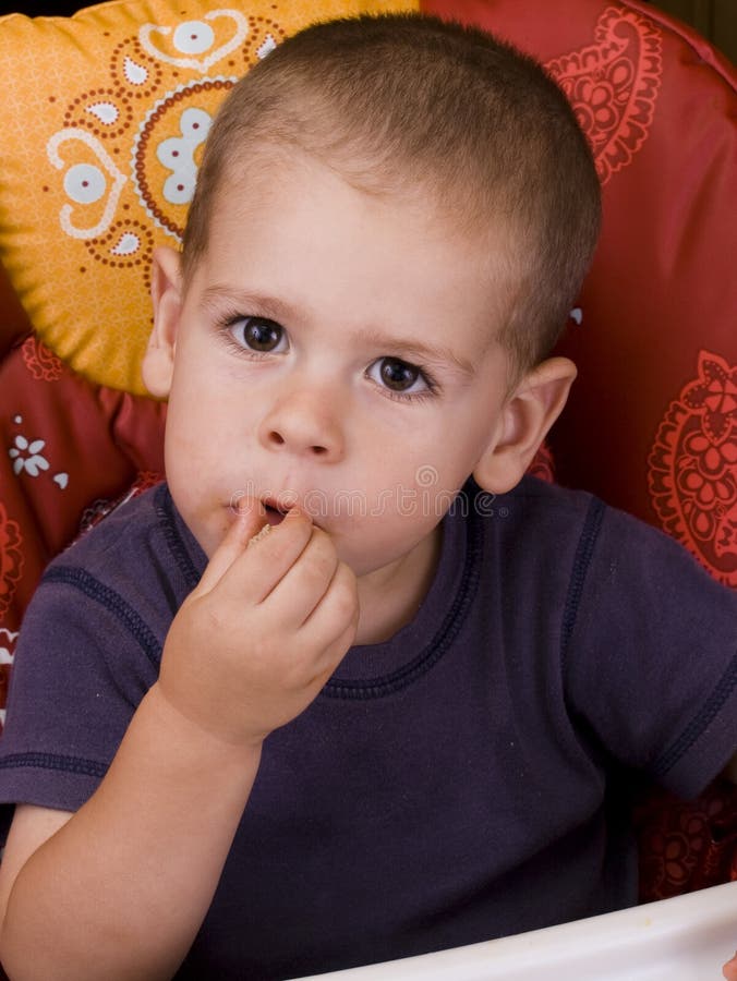 Boy eating stock photo. Image of mouth, child, joyful - 15267574
