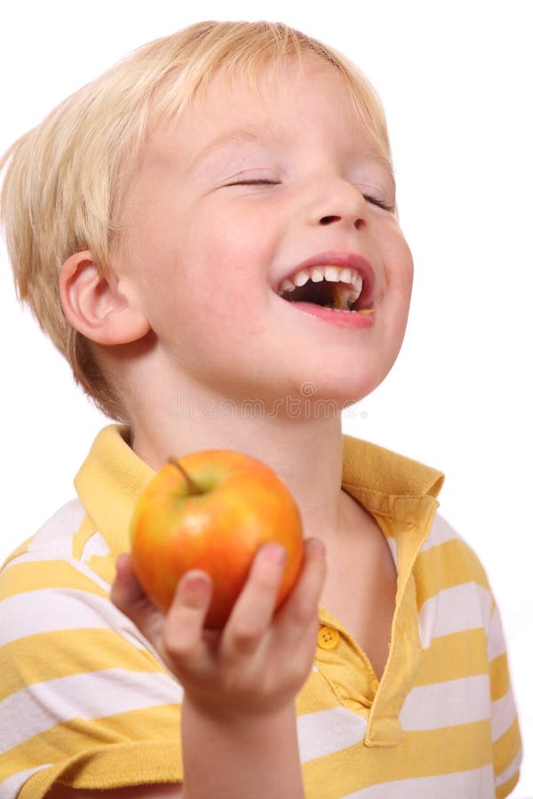 Boy eating apple stock image. Image of happy, life, people - 21811919