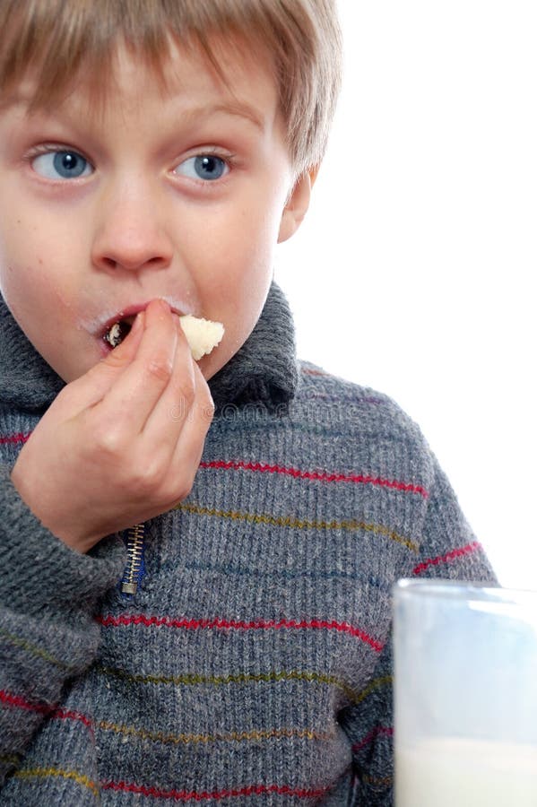 Boy Eating Bread Picture. Image: 13579787