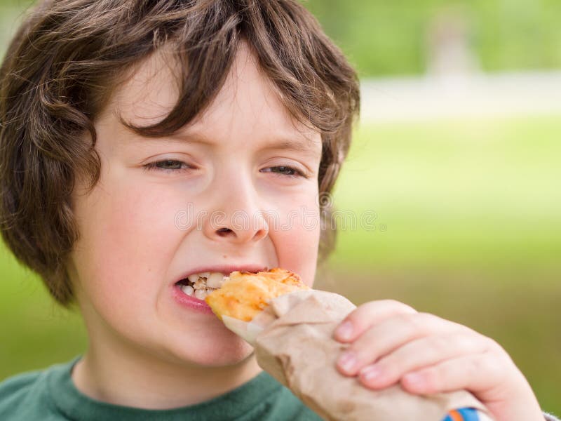 Boy eating bread stock photo. Image of young, child, food - 31191432