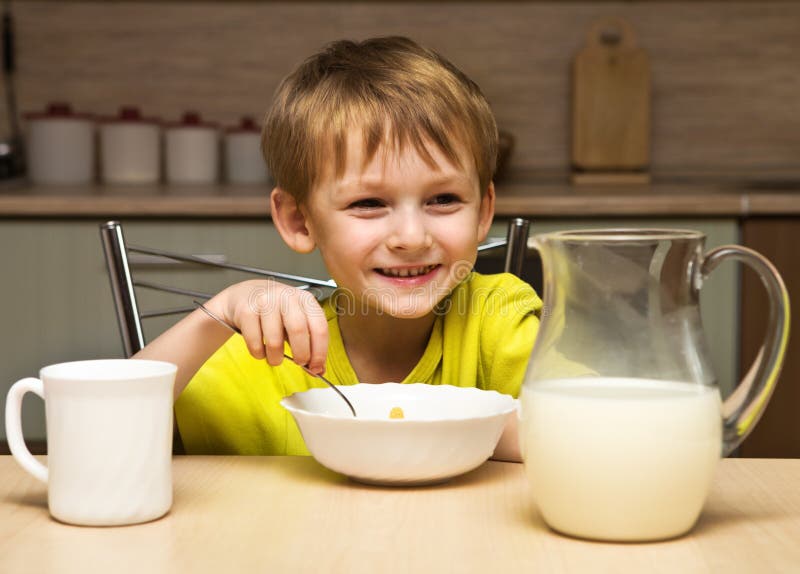 Boy eating breakfast stock photo. Image of childhood, person - 6782364