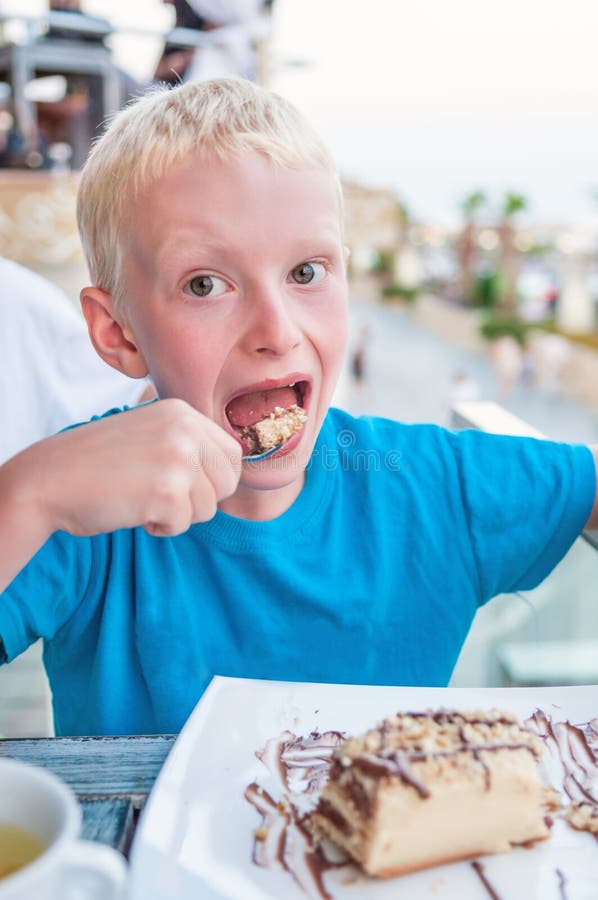 30+ Young boy eating cake Free Stock Photos - StockFreeImages