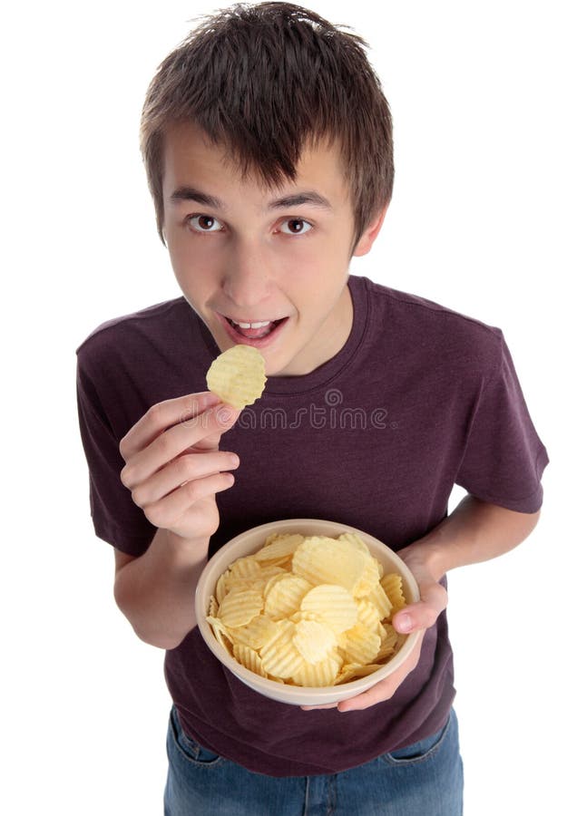 Boy Eating Chip Snack and Looking Up Stock Photo - Image of hungry ...