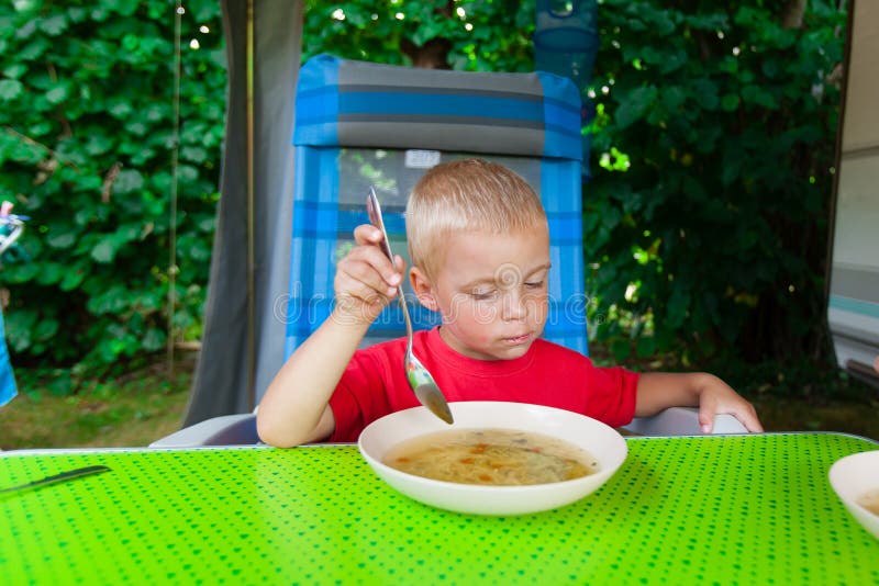 Boy eating. stock image. Image of cheerful, meal, food - 62213353
