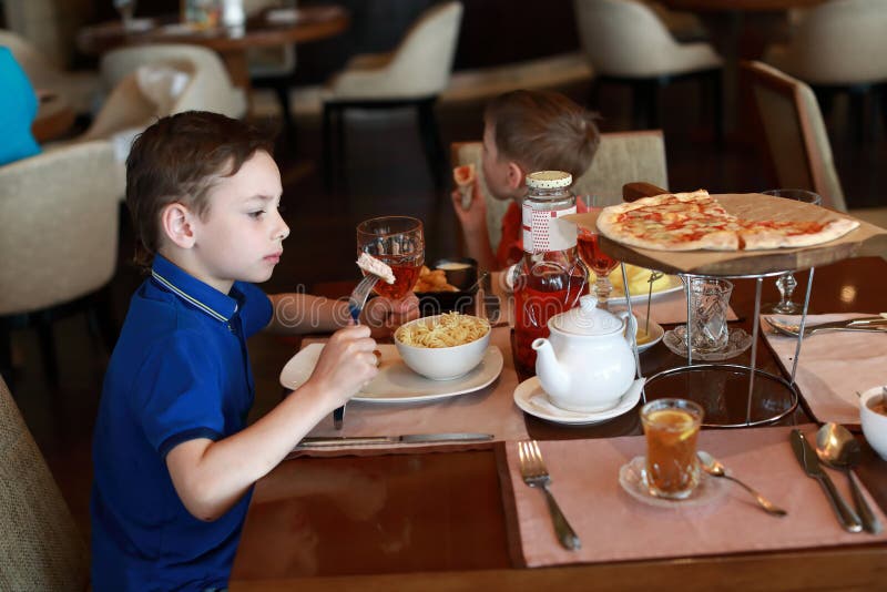 Boy Eating Cutlet with Macaroni Stock Image - Image of fork, gourmet ...