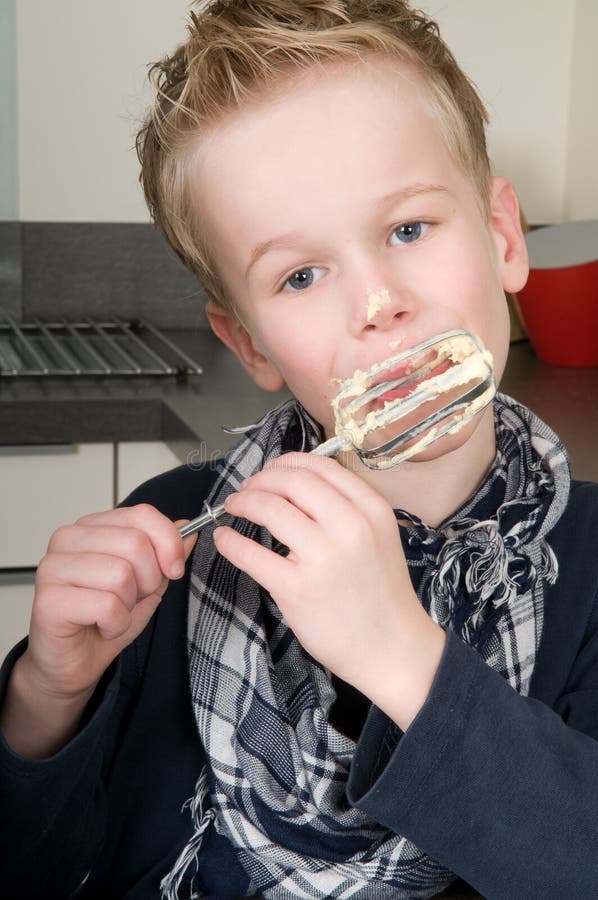 Boy Eating Dough from a Beater Stock Photo - Image of food, life: 18909508