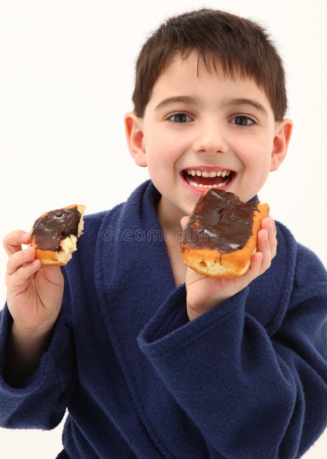 Boy Eating Doughnut stock image. Image of fattening, calories - 7985033