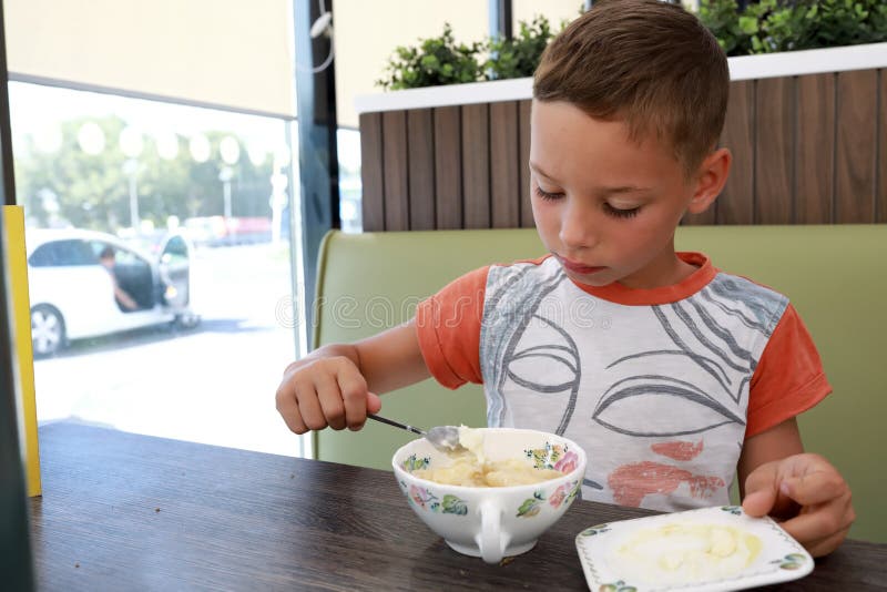 Boy eating Dumplings stock photo. Image of cute, lifestyle - 161705860