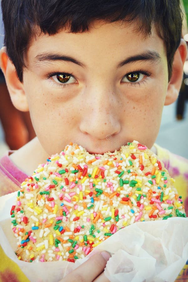 Boy Eating Giant Cookie stock image. Image of food, childhood - 78171741