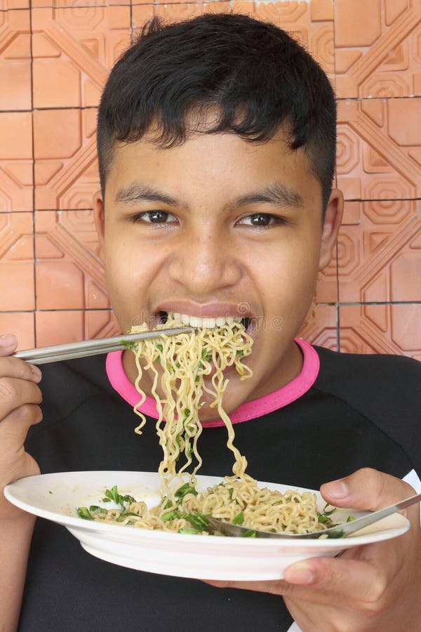 Boy Eating Noodle stock photo. Image of delicious, nutrition - 38917208