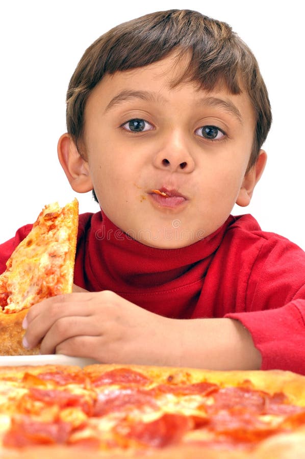 Boy eating pizza stock photo. Image of slice, brown, dinner - 22430614