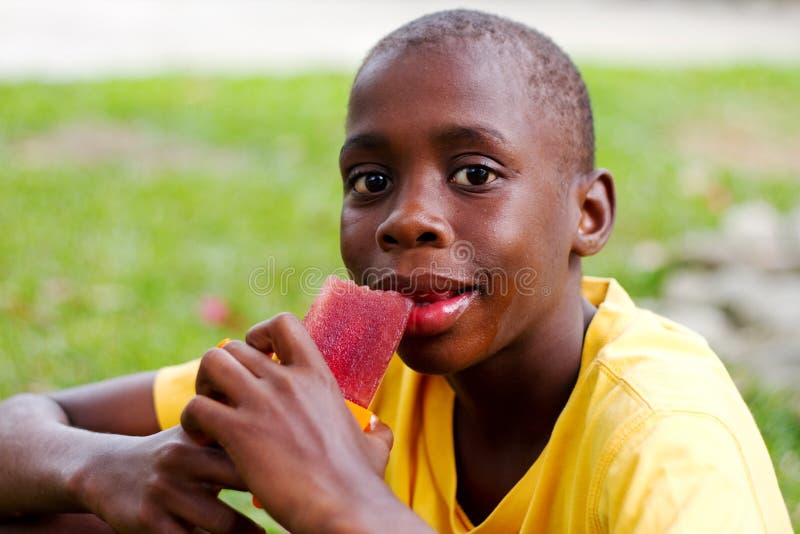Boy eating popsicle stock image. Image of happy, people - 32980721