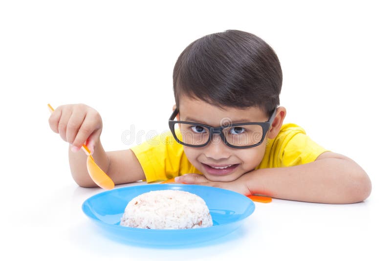 Boy eating rice. stock image. Image of cheerful, smile - 47643037