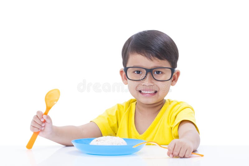 Boy eating rice. stock photo. Image of delicious, spoon - 47880076