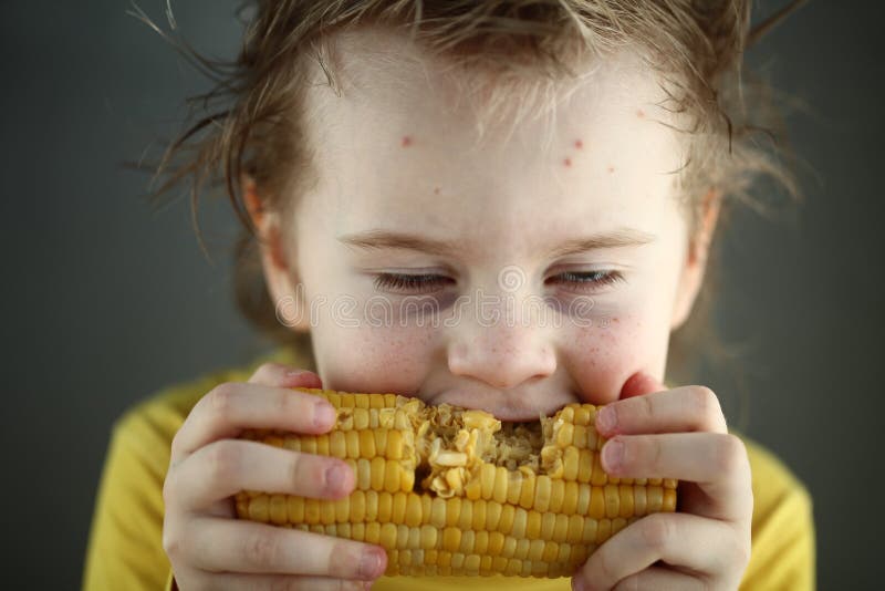 Boy Blonde Eating Sweet Corn Stock Photo - Image of healthy, cute ...