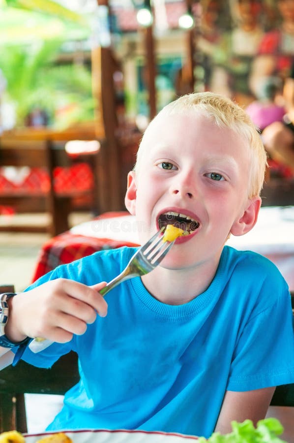 Child Eating Meat on a Skewer Stock Image - Image of caucasian, grilled ...