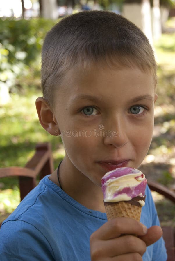 Boy eats ice cream stock image. Image of young, people - 60808213
