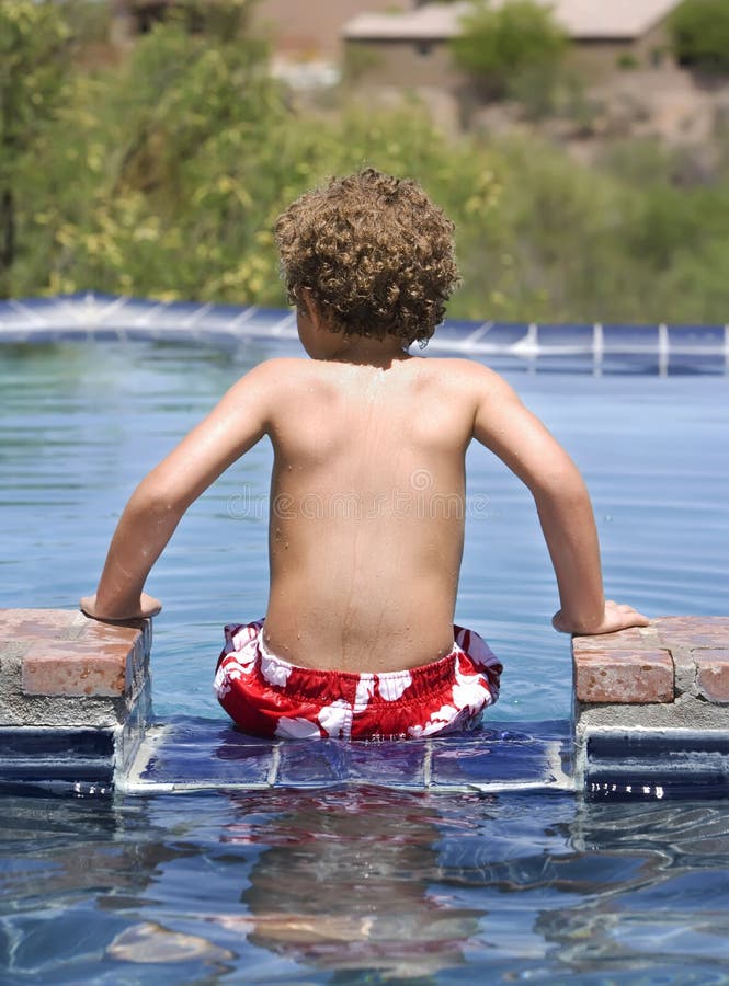 Boy on the Edge of a Swimming a Pool Stock Photo - Image of mixed ...