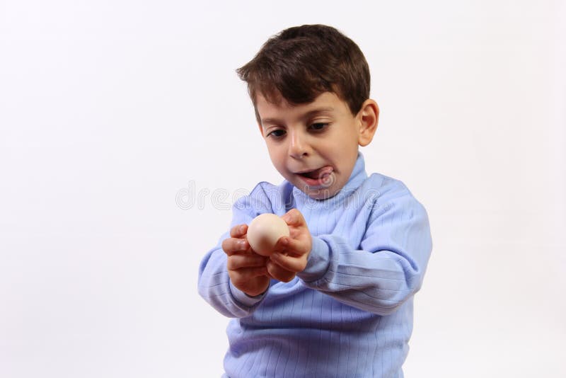Boy and egg stock image. Image of happy, eating, child - 35110371