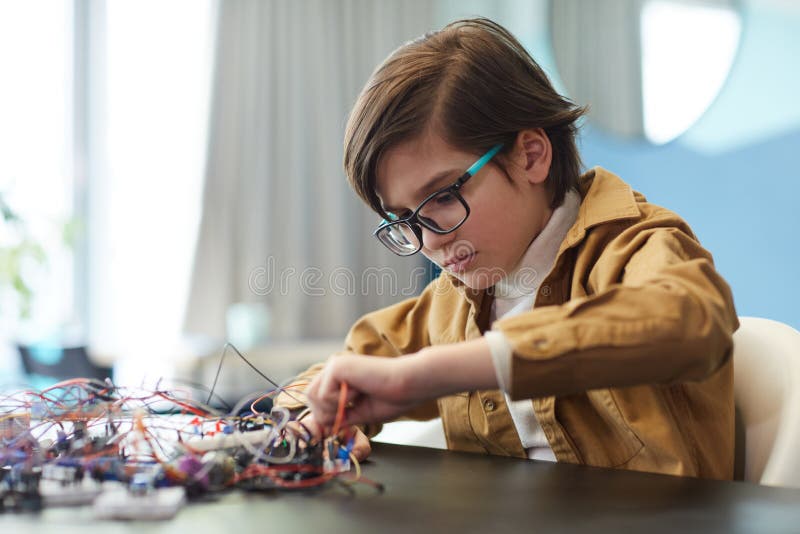 Boy in Engineering Class stock image. Image of happiness - 215182169