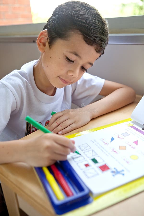 Boy Engross Doing His Writing Homework Stock Image - Image of basic ...