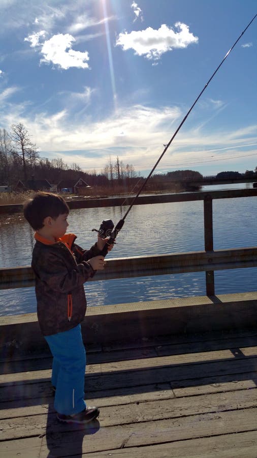 A boy enjoy fishing stock photo. Image of bridge, morning - 93044898