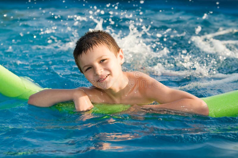Happy Child in a Swimming Pool Stock Photo - Image of holiday, happy ...