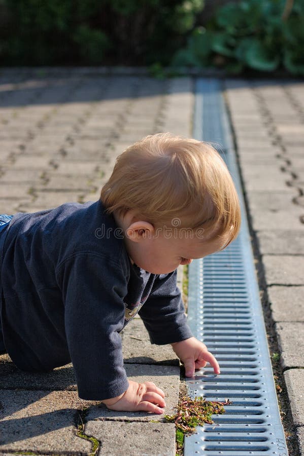 Boy Examining Gutter Yard Stock Photos - Free & Royalty-Free Stock ...