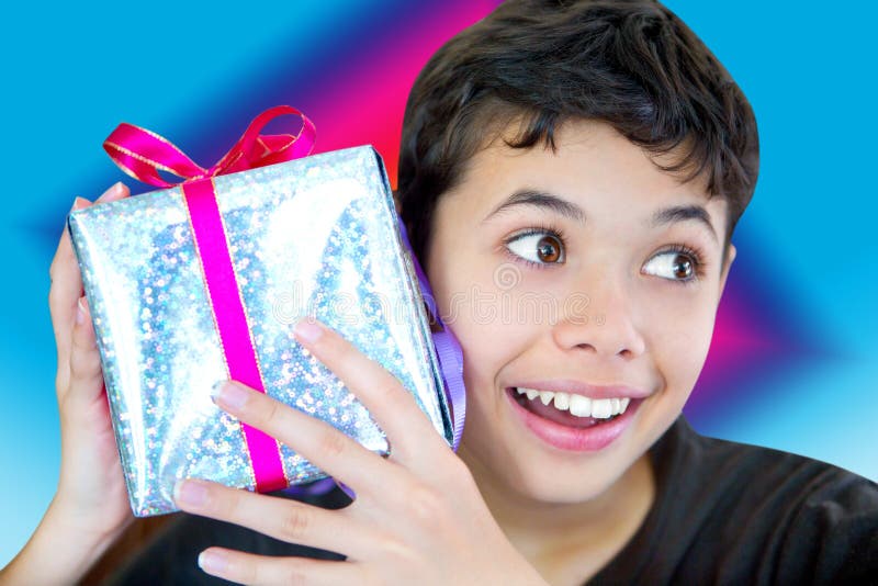 Excited Boy Holding A Wrapped Present Stock Photo - Image of birthday ...