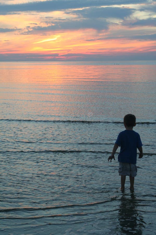 Boy Exploring Ocean stock image. Image of summer, evening - 3029929