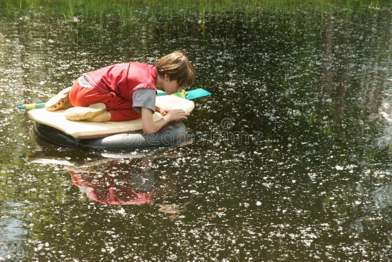 Boy Exploring Pond stock image. Image of explore, child - 20261389