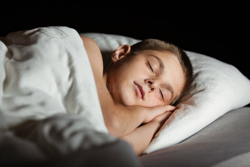 Single Teen Boy Asleep in Bed Stock Photo - Image of peaceful, single ...