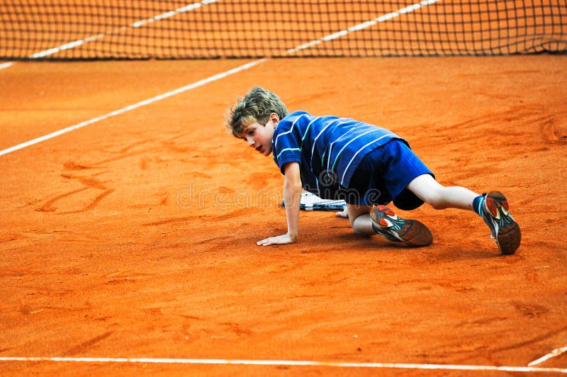 Boy Falling Over in Tennis Game Stock Image - Image of leisure ...