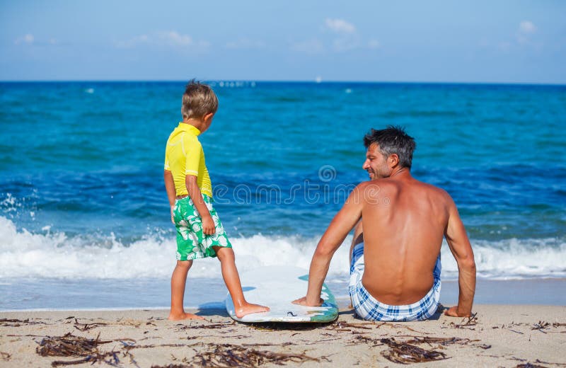 Father with son surfing stock photo. Image of sunny, holiday - 35790034