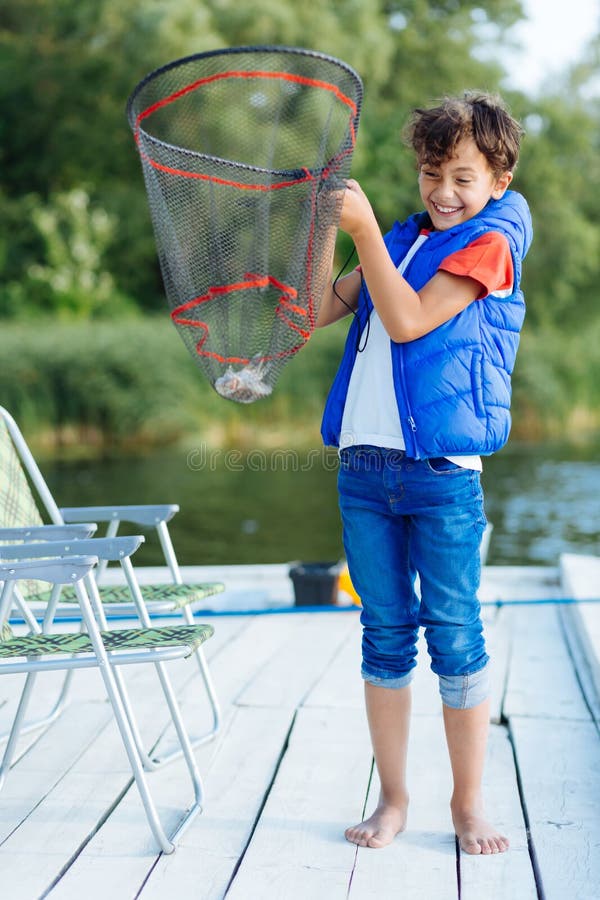 Boy Feeling Amazing after Catching Fish while Holding Net Stock Image ...