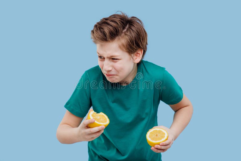 Preteen Boy Taste a Fresh Lemon, Sour Taste Stock Photo - Image of ... Preteen Boy Taste a Fresh Lemon, Sour Taste Stock Photo - Image of ...