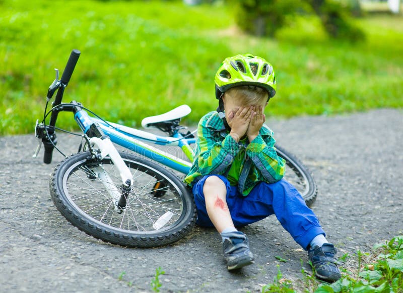 Boy Fell from the Bike in a Park Stock Photo - Image of learning ...