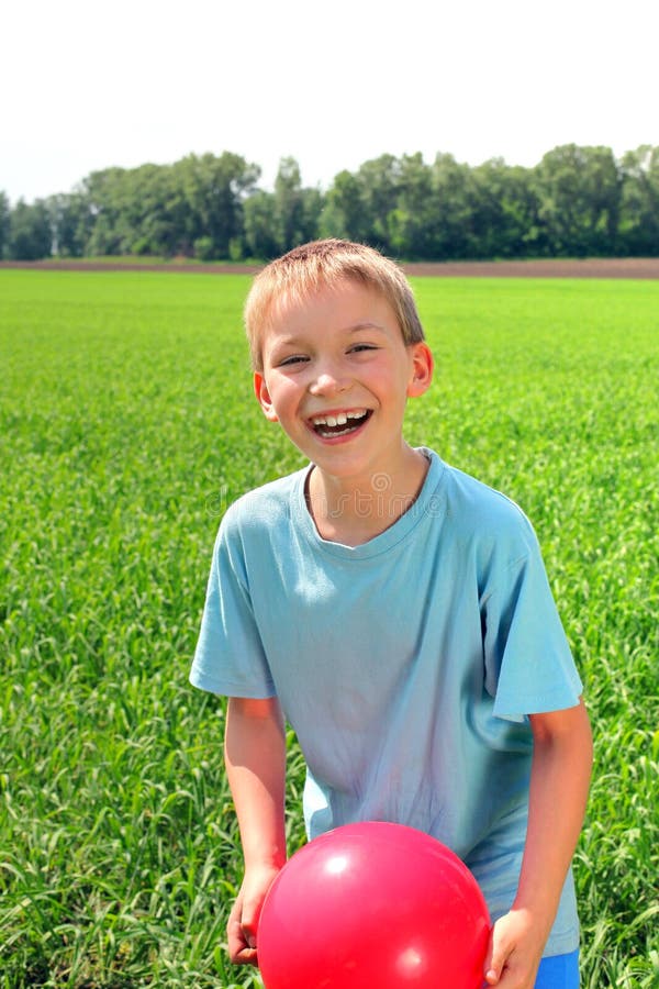 Boy in the field stock photo. Image of happy, cheerful - 23220098