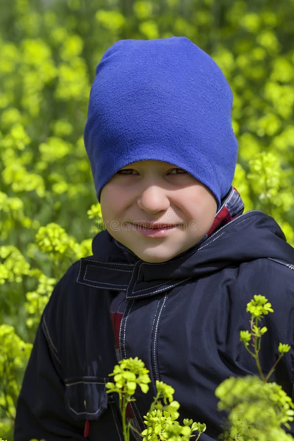 Boy in the Field with Flowers Stock Image - Image of funny, human ...